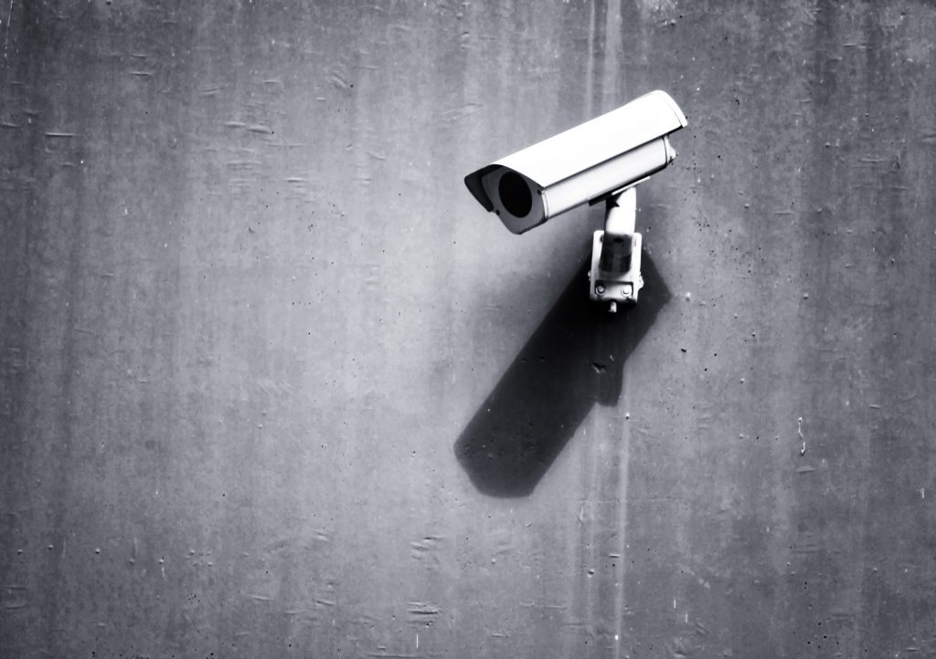 Gray security camera with shadow - Atlantic Security Inc.