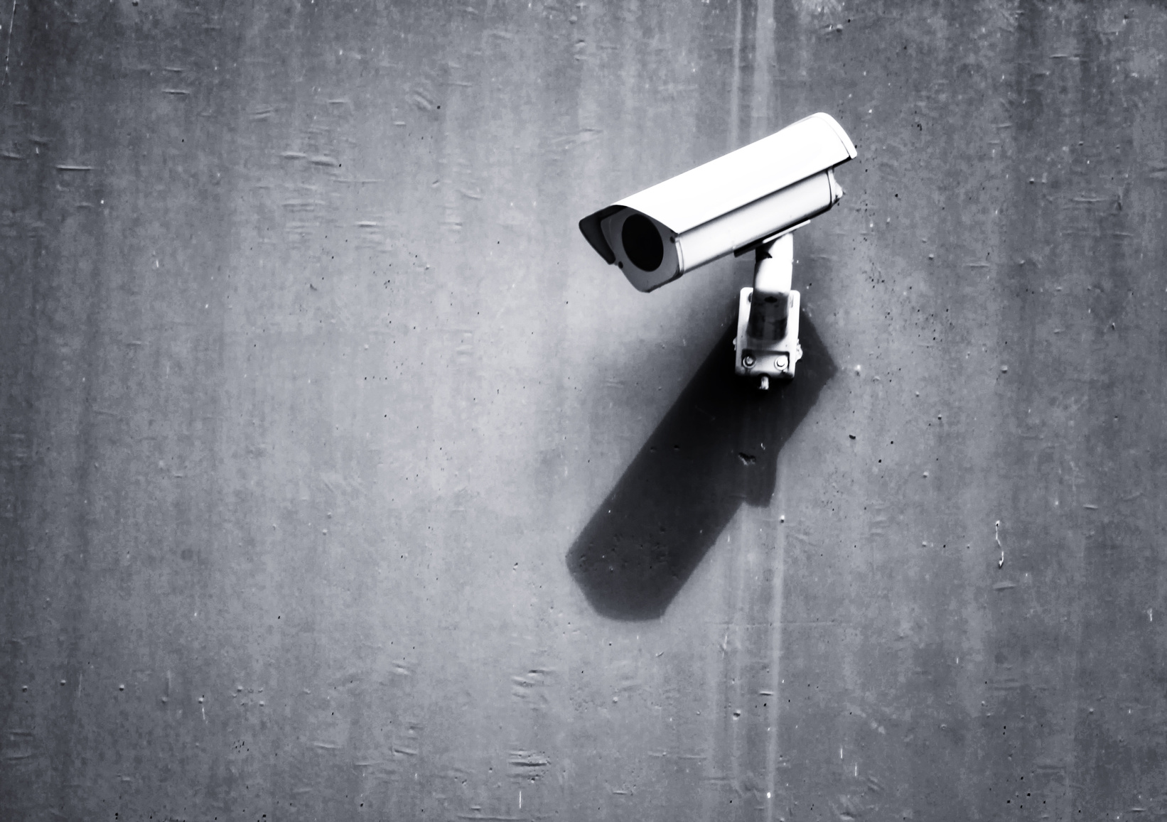 Gray security camera with shadow - Atlantic Security Inc.